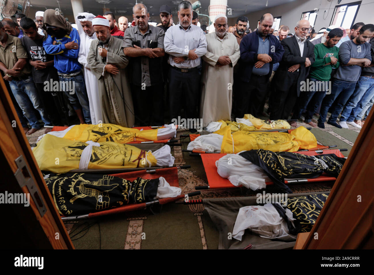(EDITOR’S NOTE: Image depicts death)Palestinians pray next to the ...