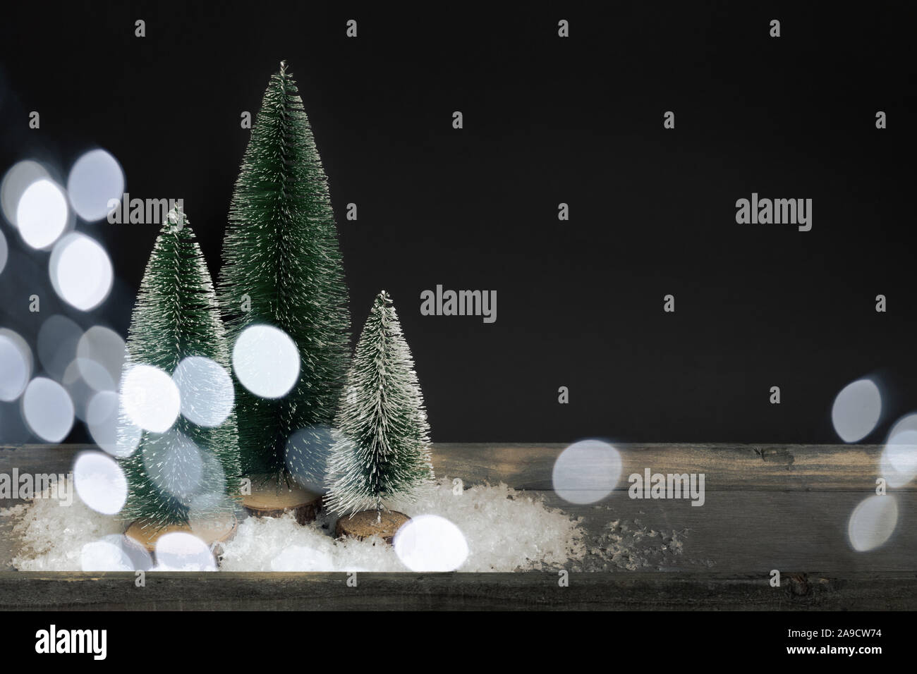 Three small christmas trees hi-res stock photography and images - Alamy