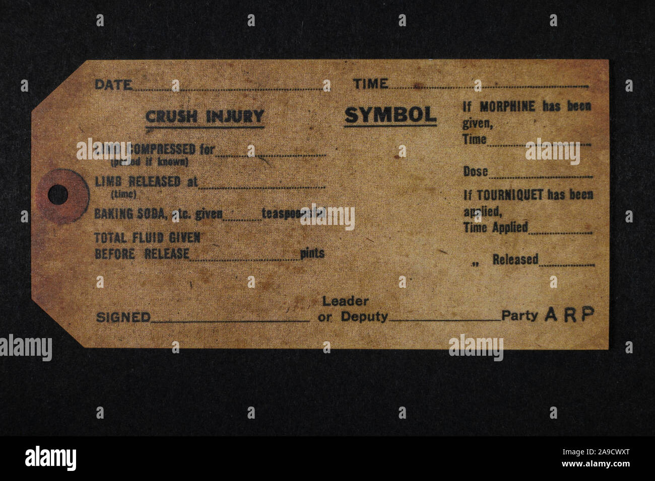 An ARP body tag placed on unconscious or dead victims of air raids, a ...