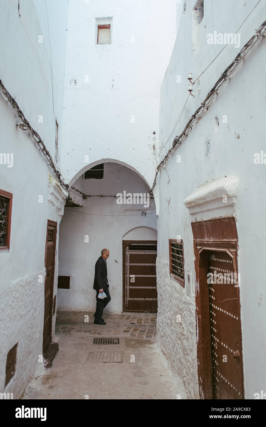 Passers by in narrow alley in old town hi-res stock photography and ...