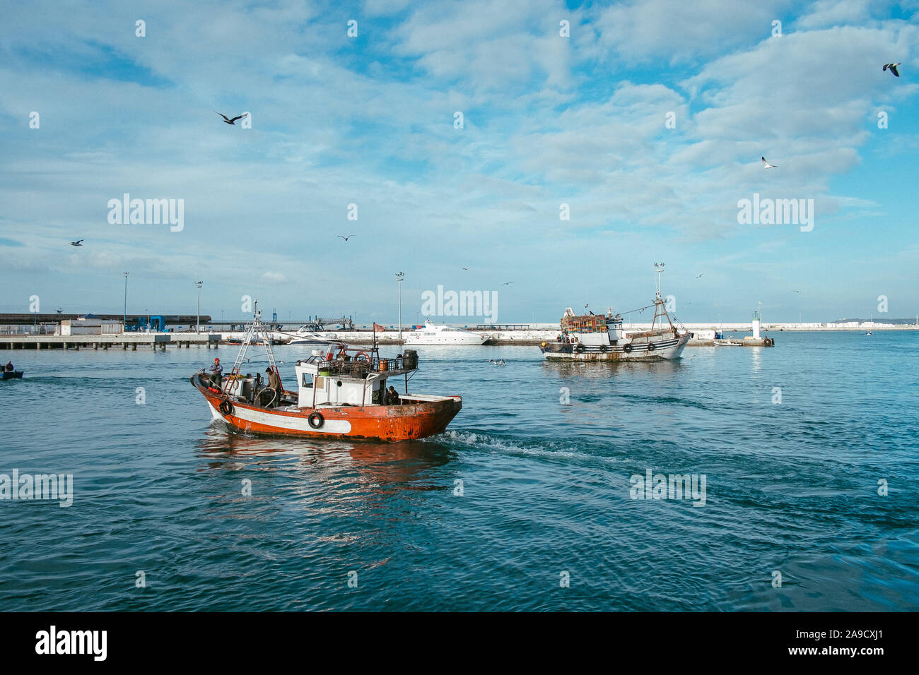 Fishing boats at the harbor of Tangier, Morocco Stock Photo - Alamy