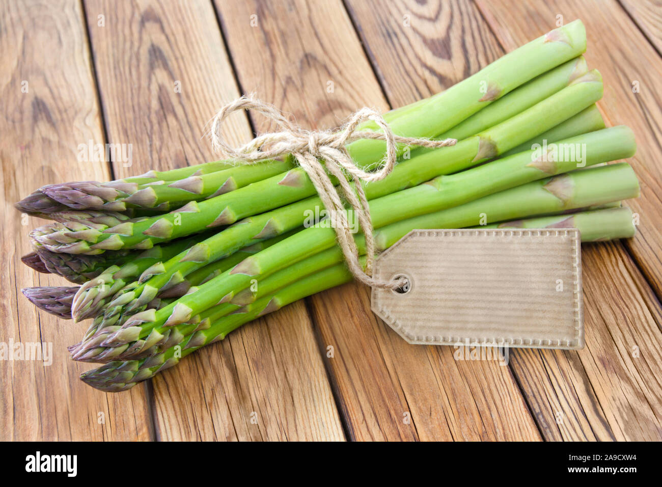 Green asparagus and label Stock Photo - Alamy