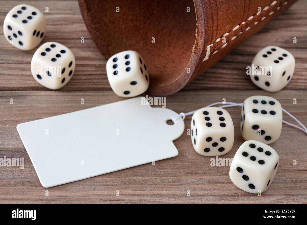 Game of dice and label Stock Photo - Alamy