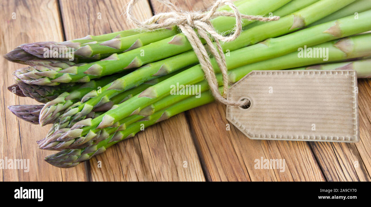 Green asparagus and label Stock Photo - Alamy