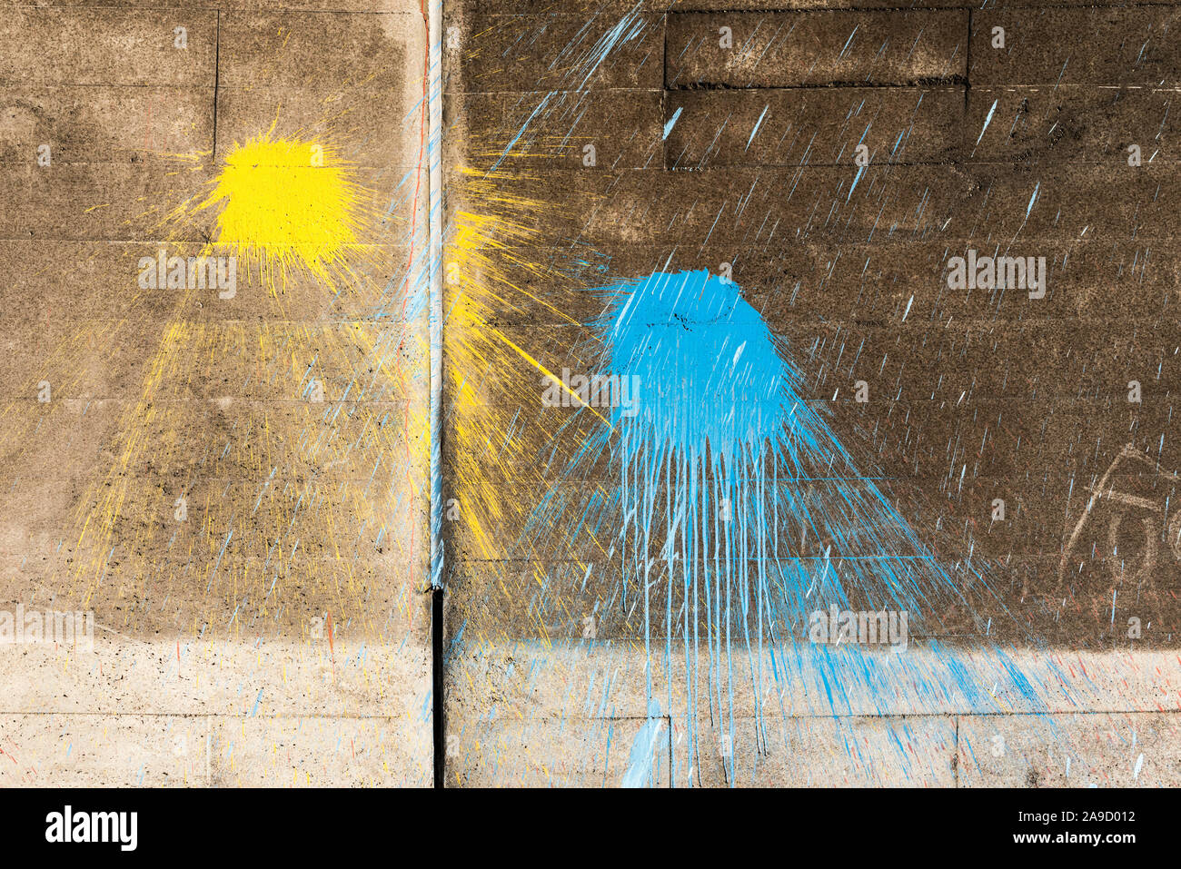 Colour drop on a wall Stock Photo - Alamy