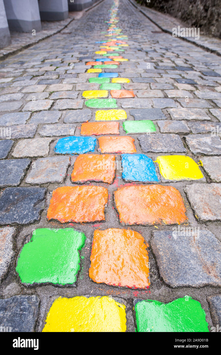 Brightly painted paving-stones in the Old Town of Passau Stock Photo ...