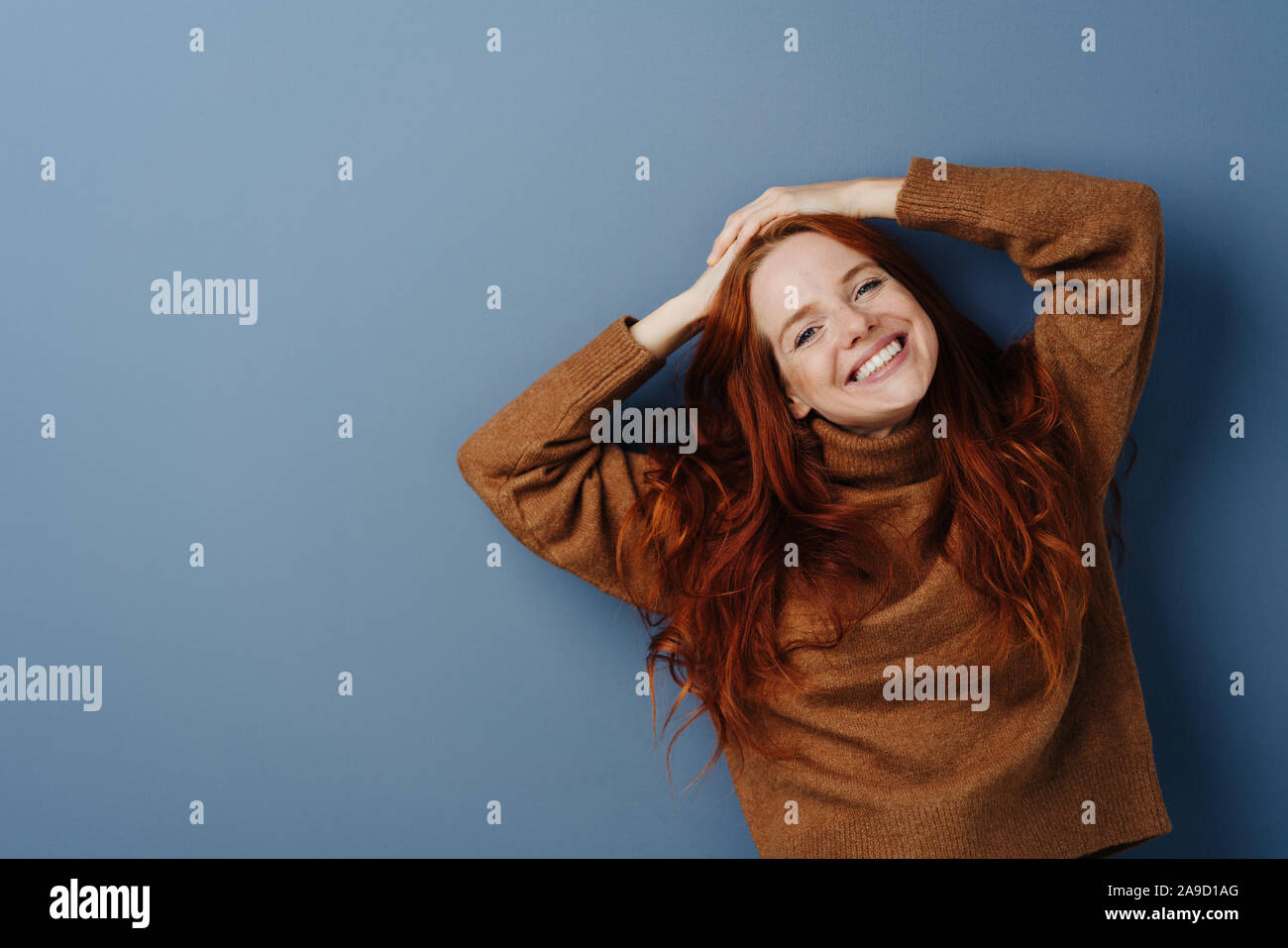 Hands raised over her head hi-res stock photography and images - Alamy