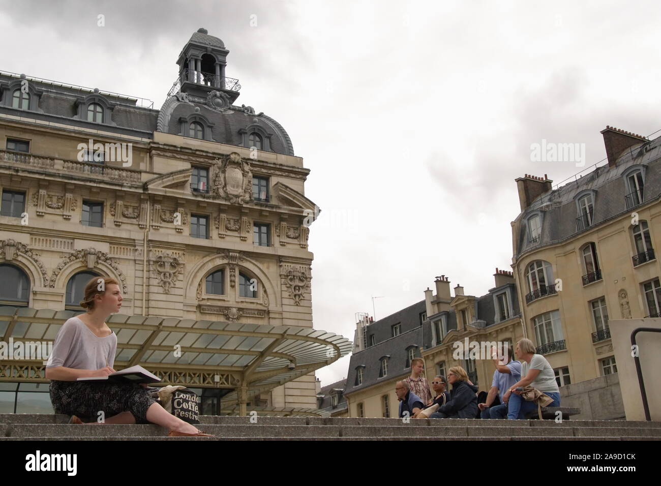 Paris, Ile de France / France - June 20, 2016: Tourist draws in her ...