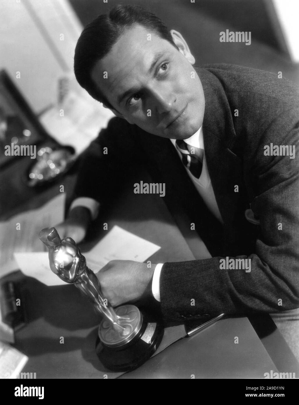 FREDRIC MARCH with his Academy Award / Oscar for Best Actor of 1931 in DR. JEKYLL AND MR. HYDE ...