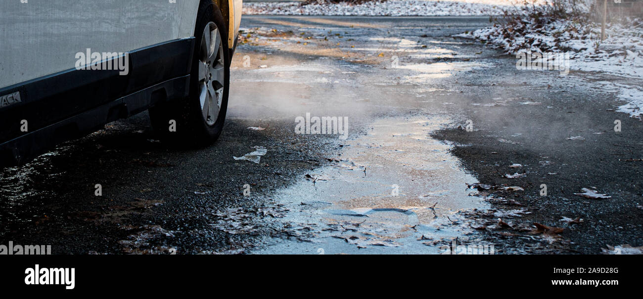 Car in the freezing ice cold driveway Stock Photo - Alamy
