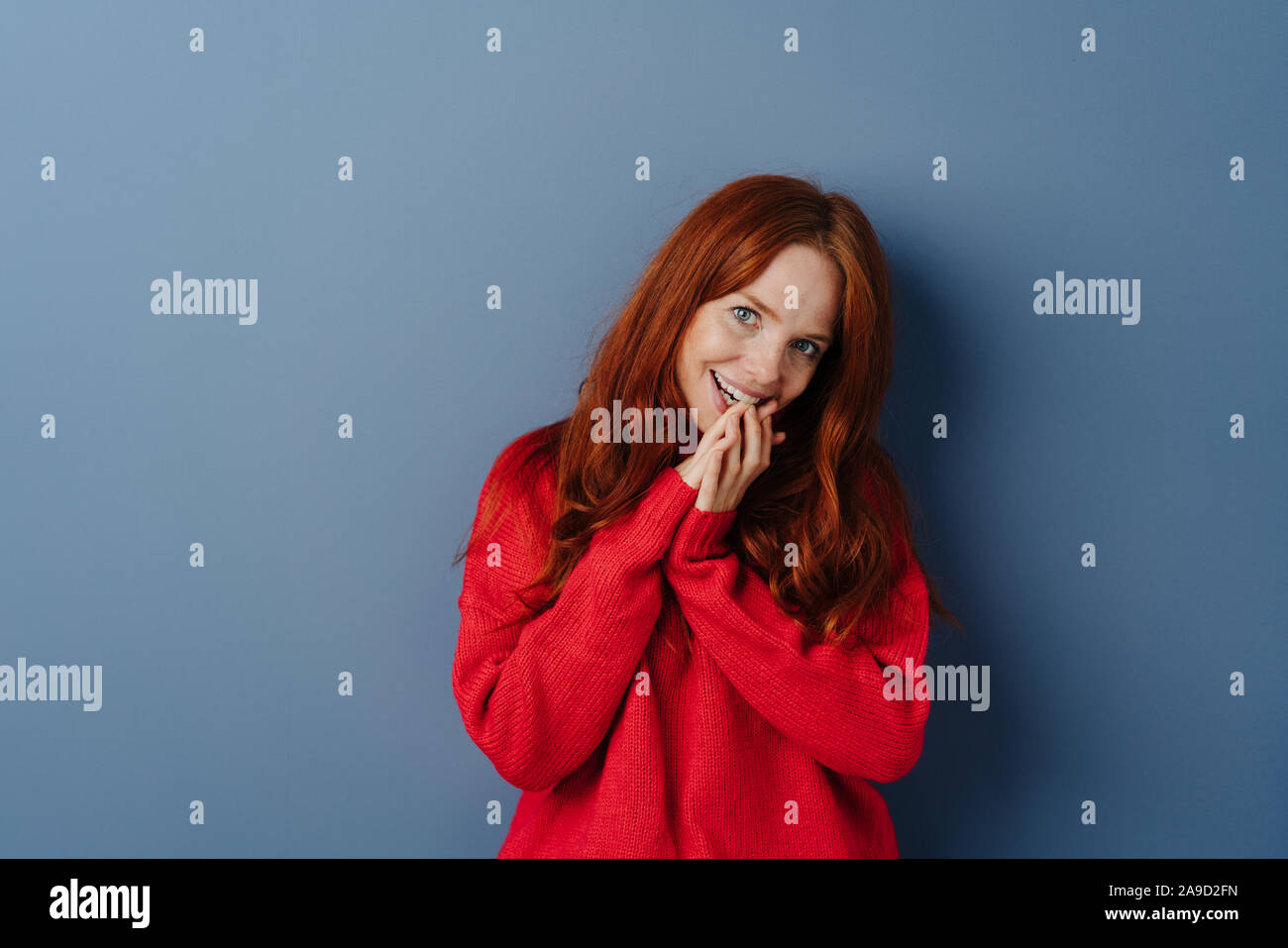 Woman coy shy expression hi-res stock photography and images - Alamy