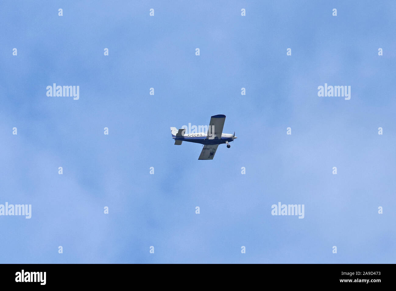 Robin HR200/120B single engined light aircraft G-ECAG flying overhead ...