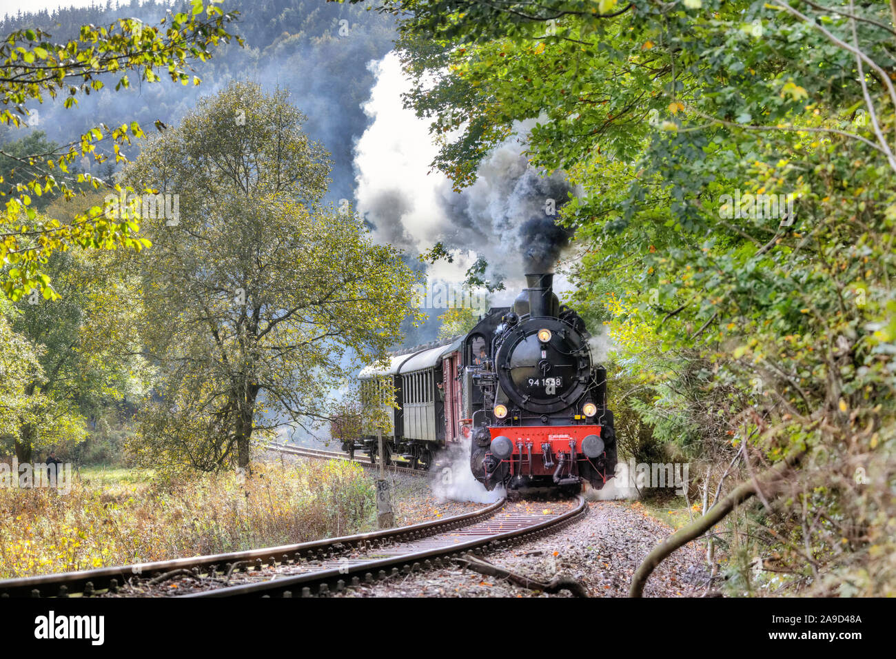 Train goes in a bend, steam locomotive, smoke, steam, wood Stock Photo ...