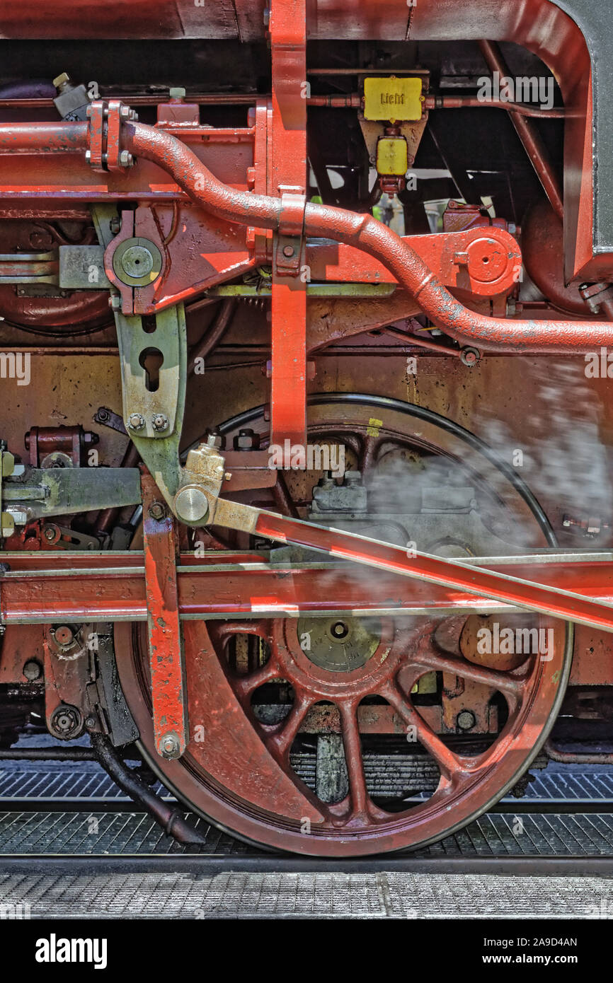 Wheel, sticks, levers, vapour, steam locomotive Stock Photo - Alamy