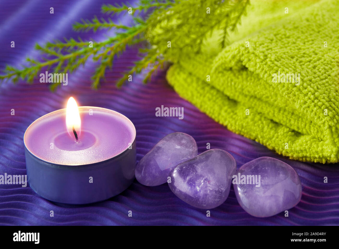 Wellness Candle and Gemstones Stock Photo - Alamy