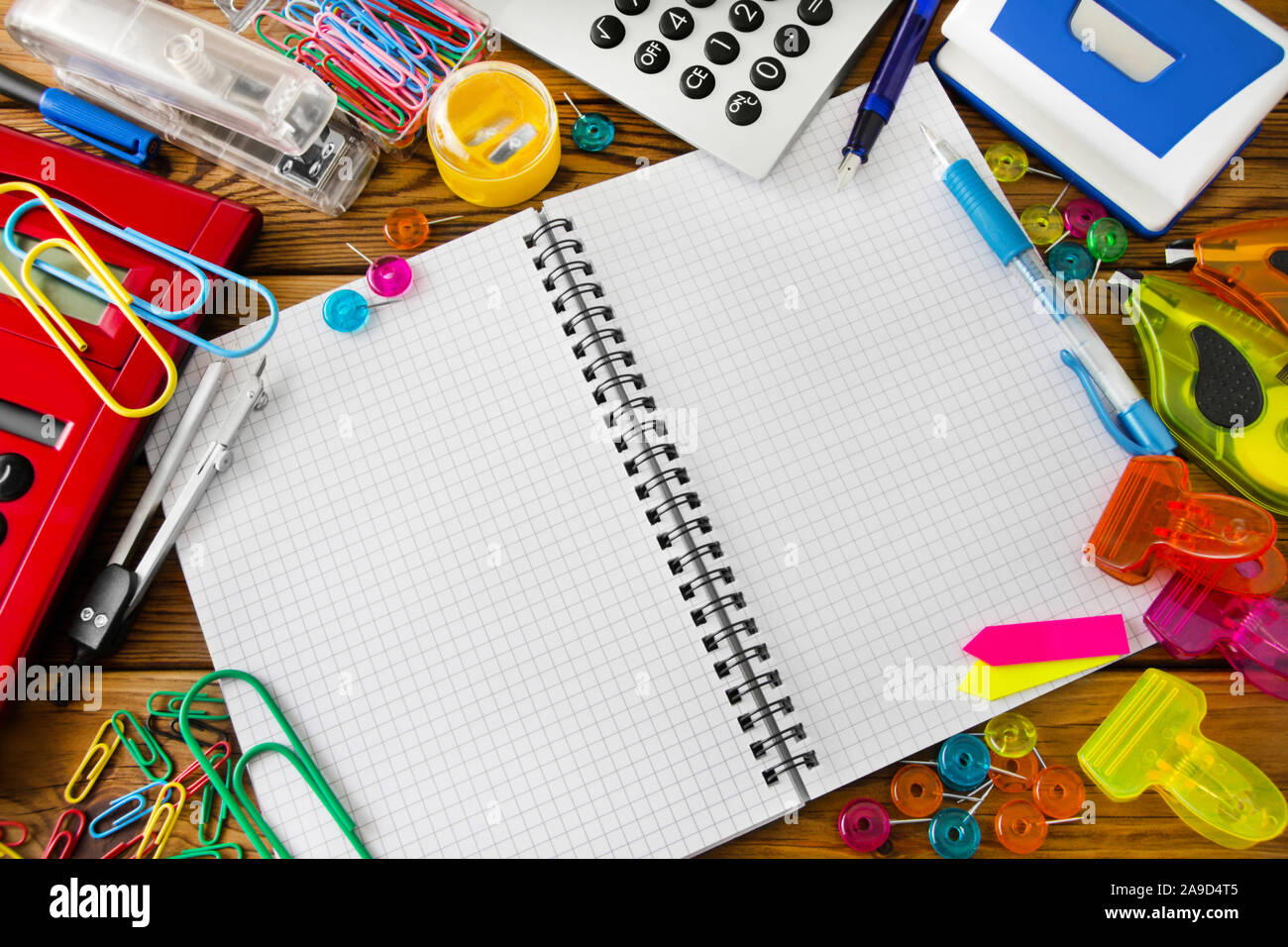 Desk and colorful stationery Stock Photo - Alamy