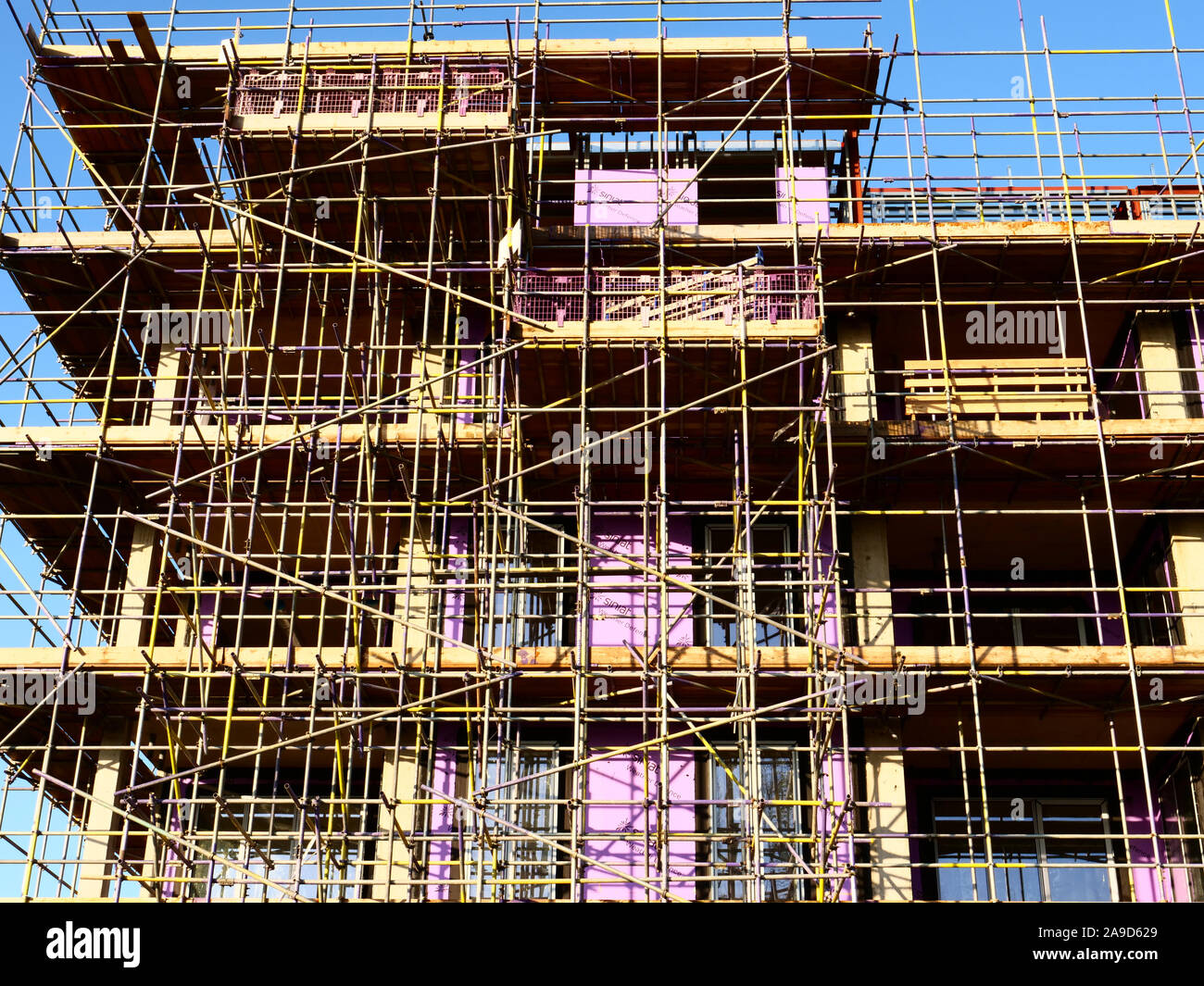 Scaffolding seen at a new building development Mill Hill East, London ...
