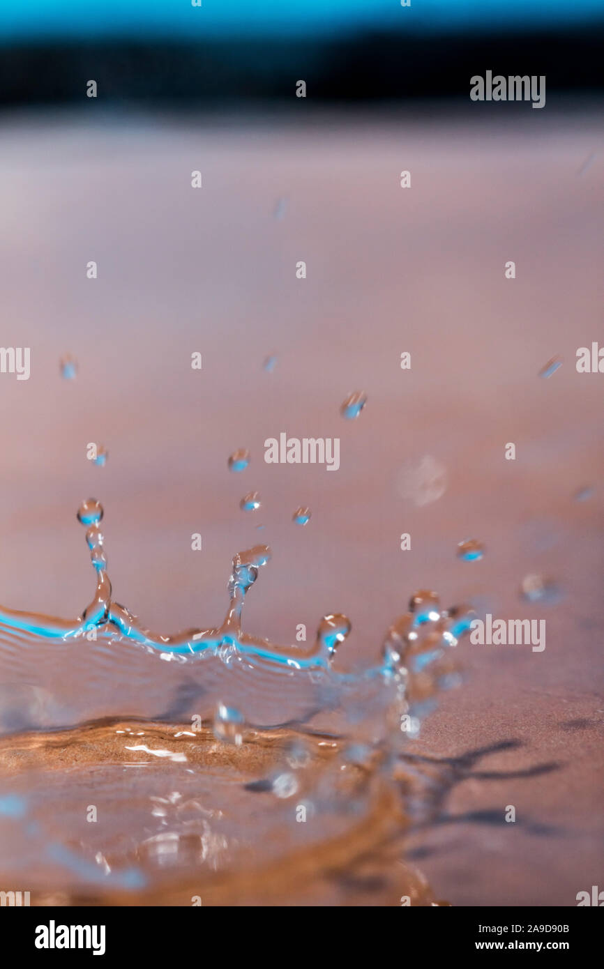 Close-up terracotta tile and dripping water drop Stock Photo - Alamy