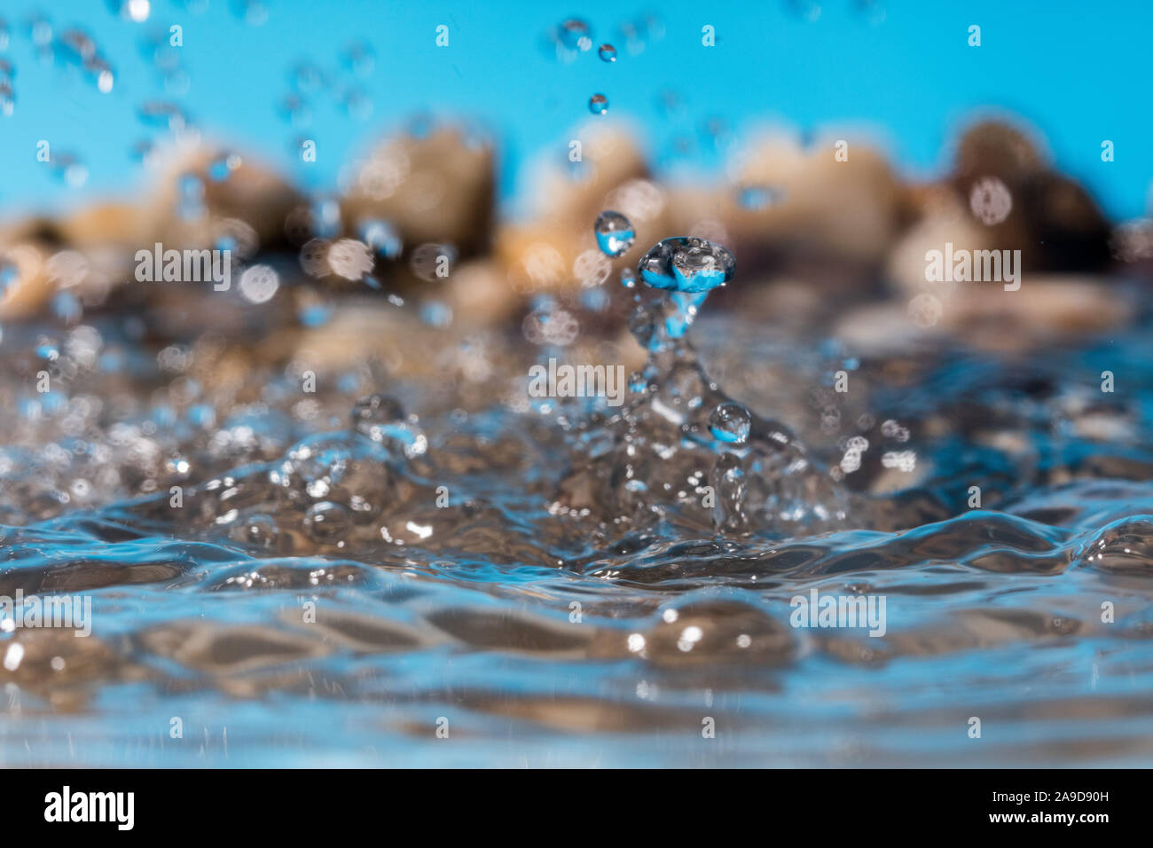 Close up raindrops falling puddle hi-res stock photography and images ...
