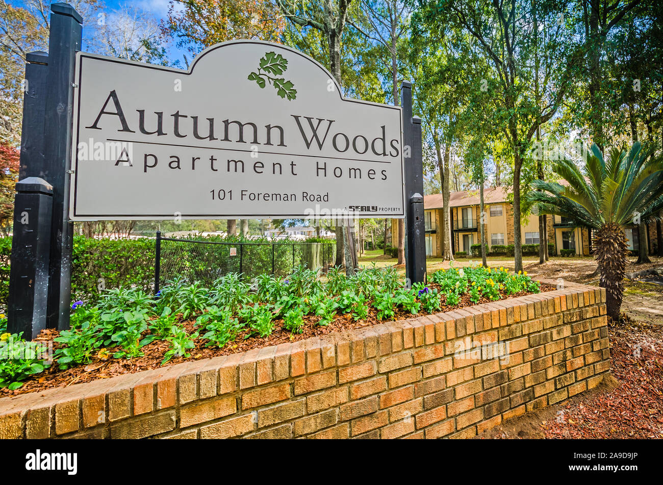 An entrance sign welcomes residents to Autumn Woods apartment homes in ...