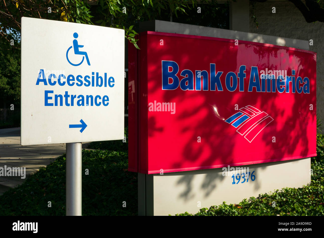 Accessible entrance sign with right arrow directs Bank Of America ...