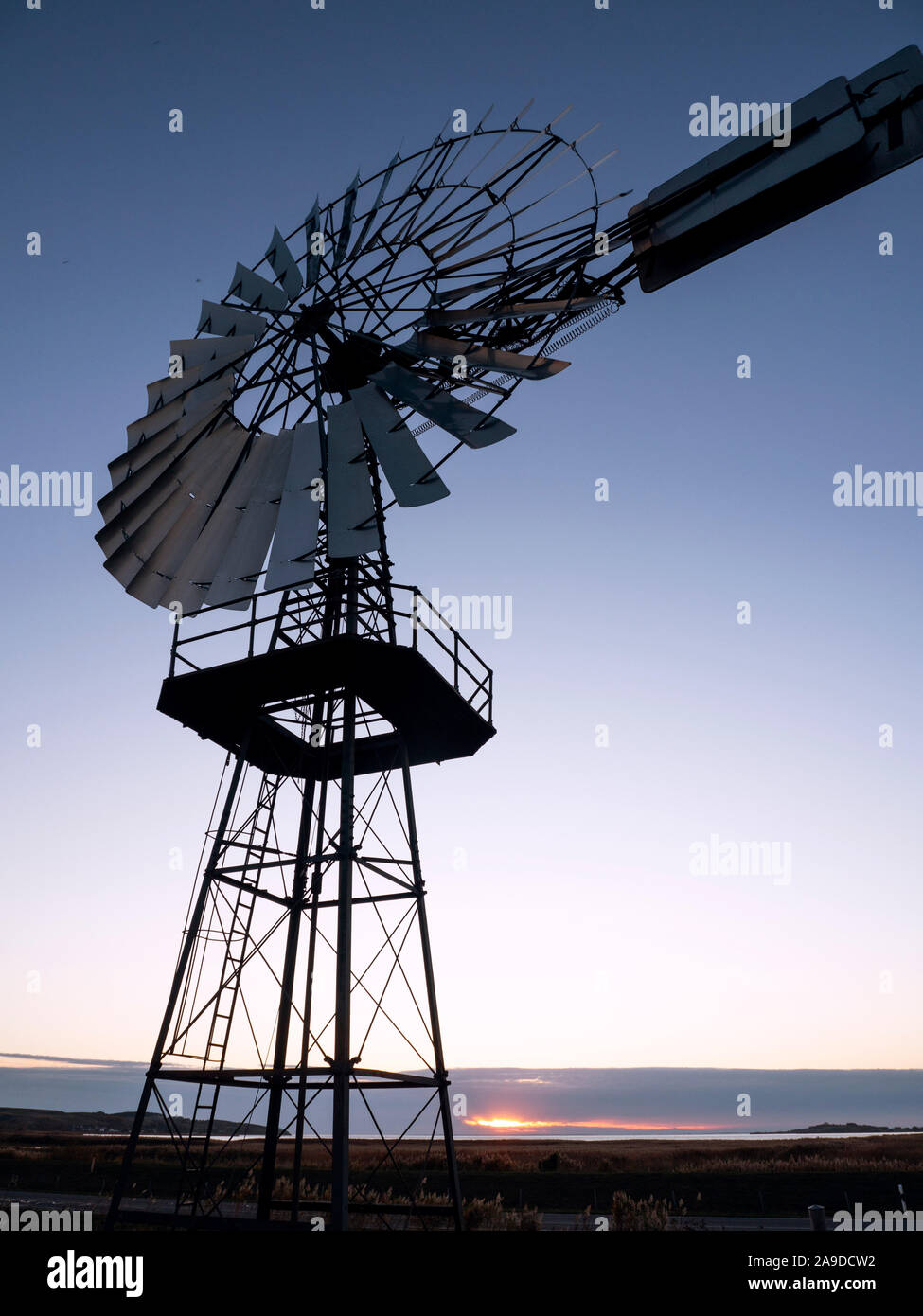 Sun setting on an autumn evening over the sea with hi-res stock ...