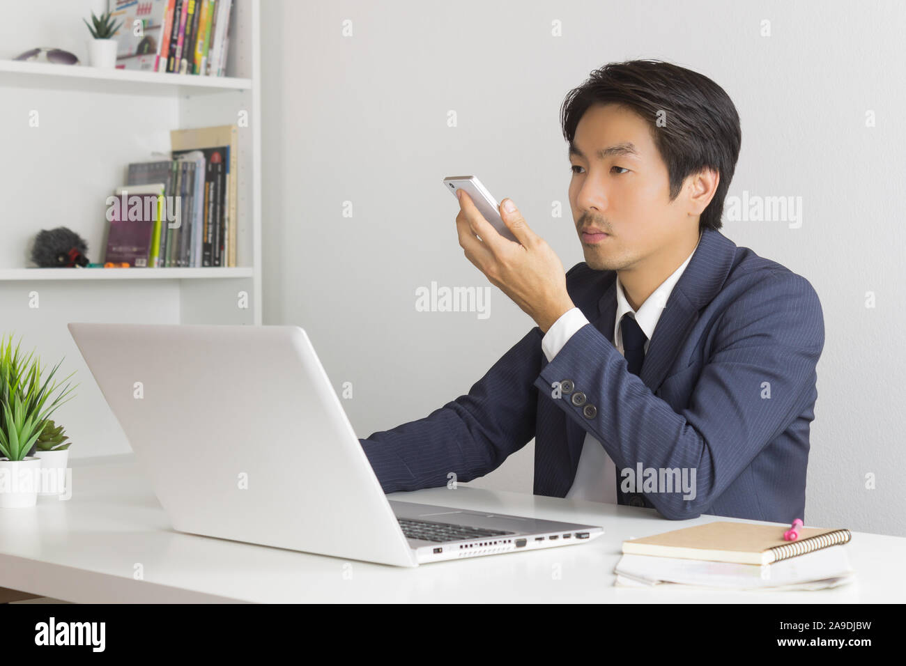 Asian Financial Advisor or Asian Consulting Businessman Talking and ...