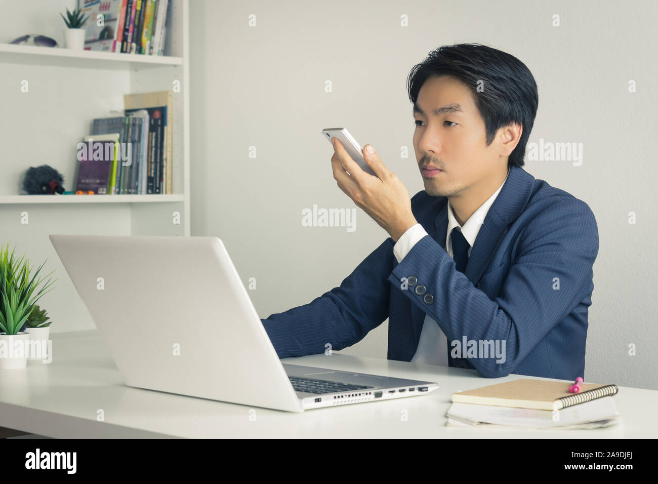 Asian Financial Advisor or Asian Consulting Businessman Talking and ...