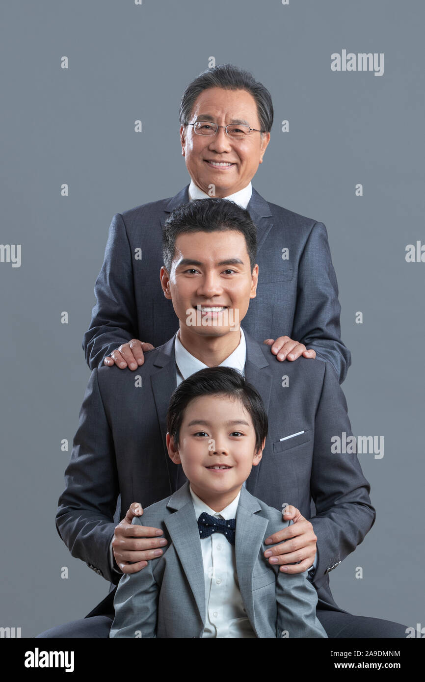 Three generations father son grandson hi-res stock photography and ...