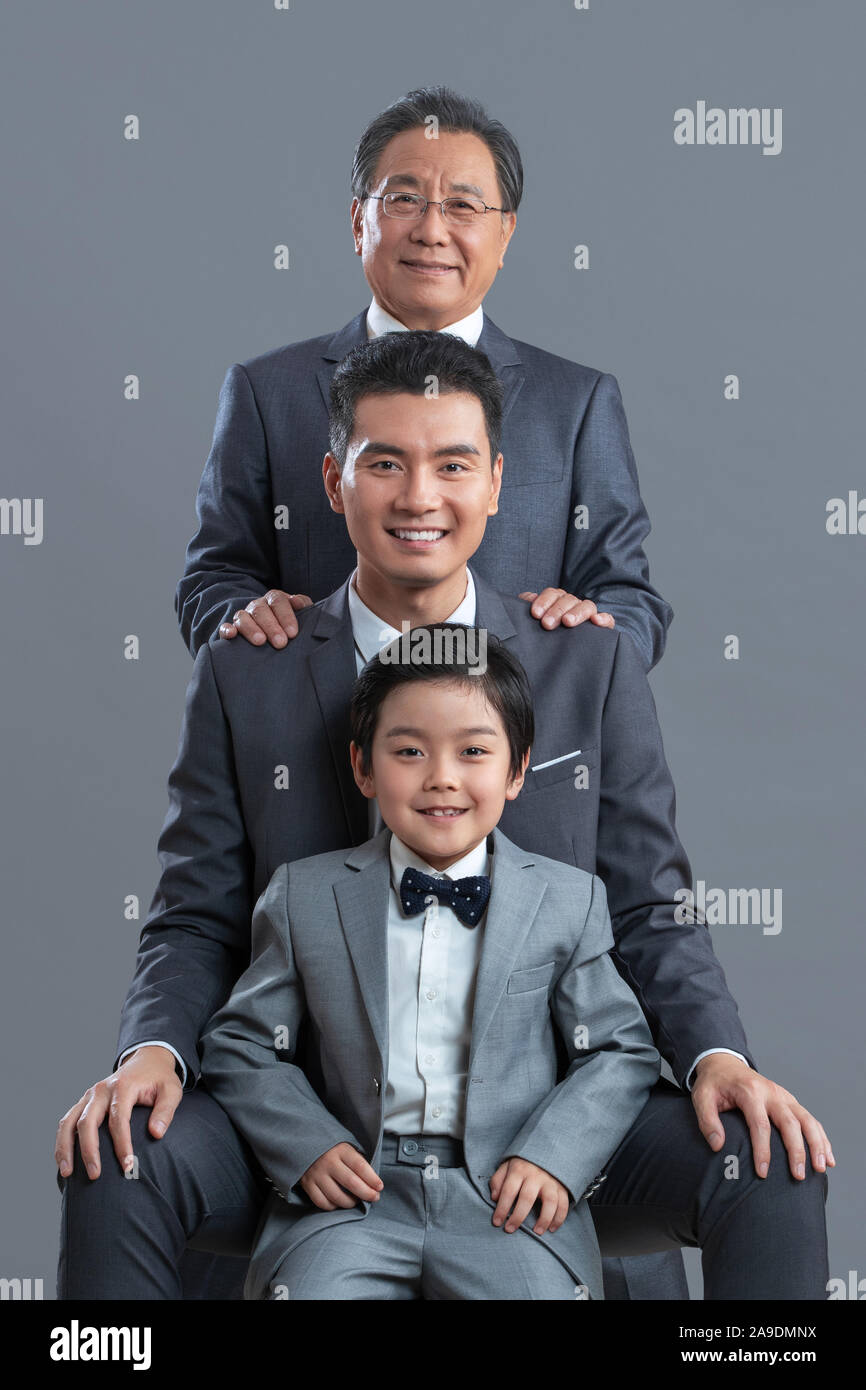 Three people between the two generations Stock Photo - Alamy