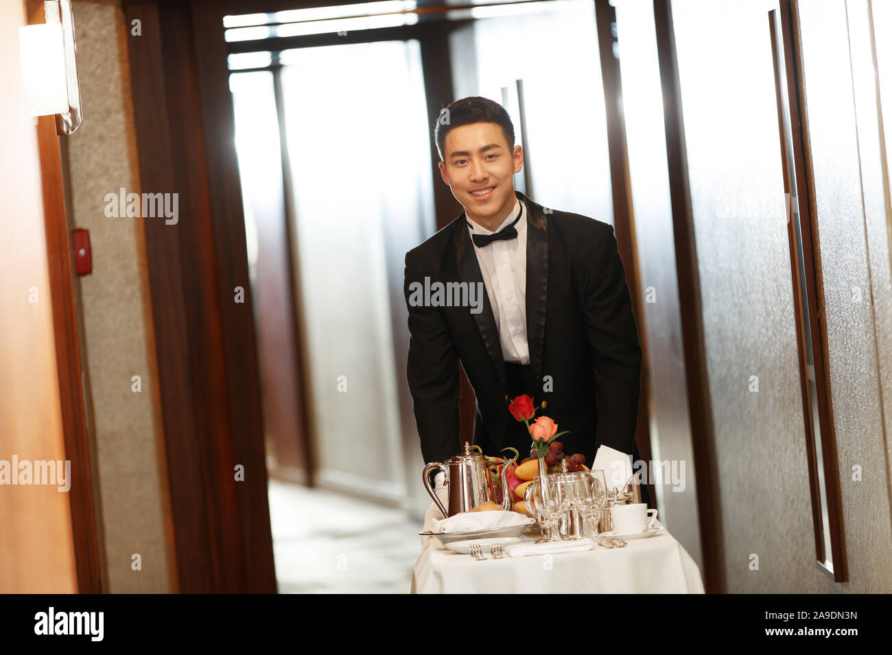 The hotel waiter Stock Photo - Alamy