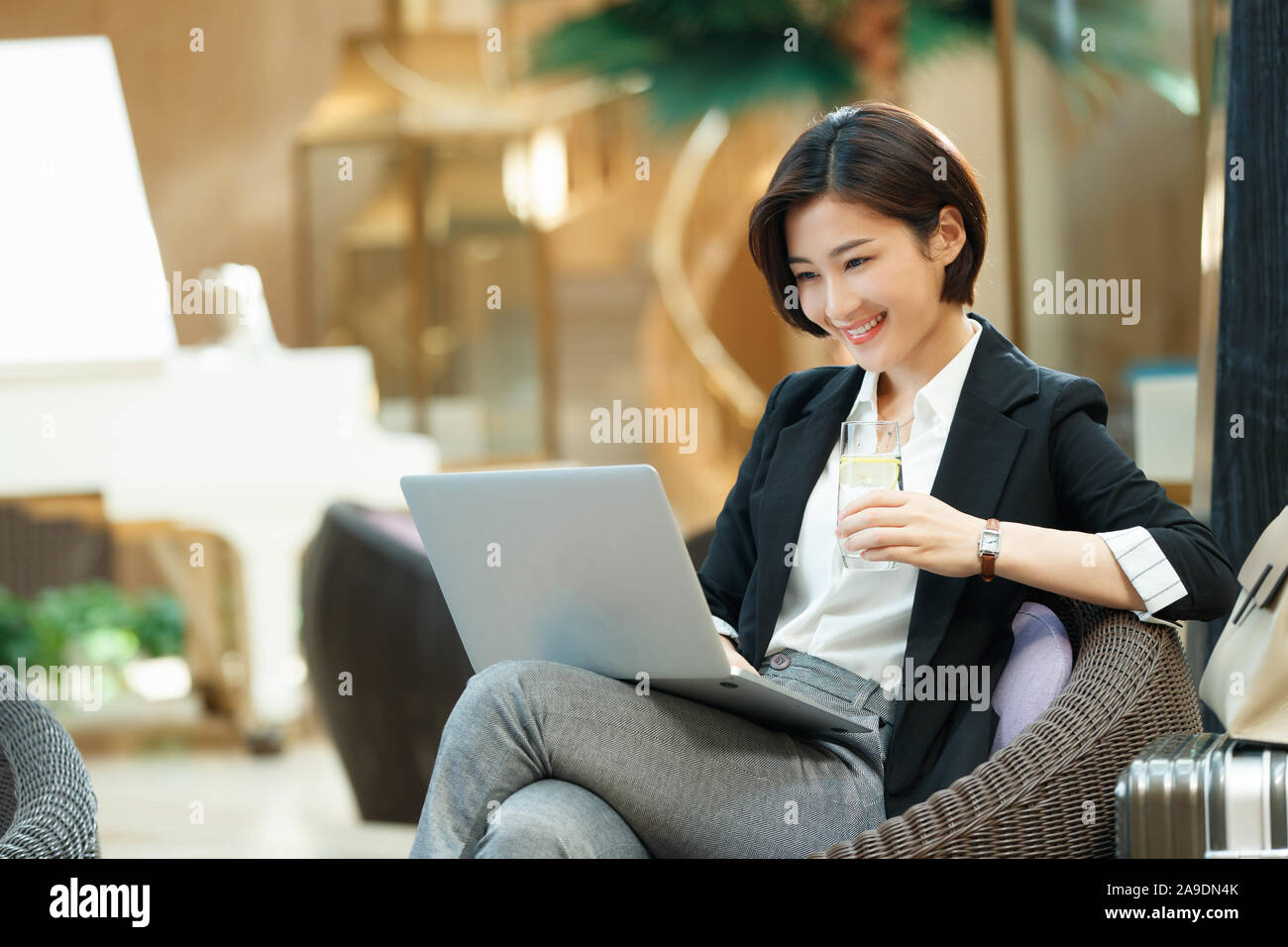 Business woman use the computer Stock Photo - Alamy