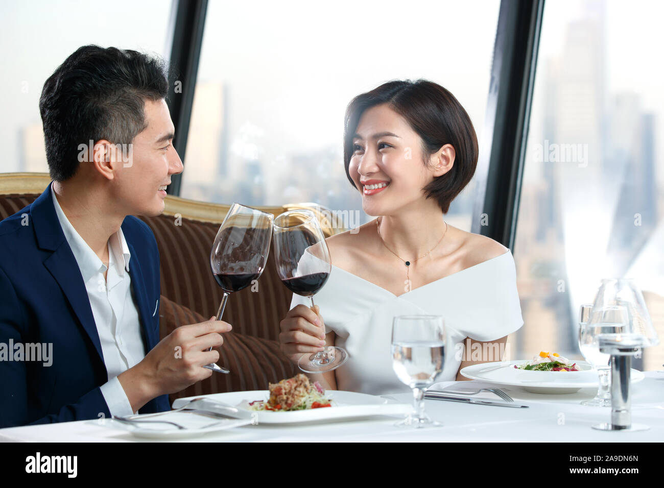 Young couples in the restaurant Stock Photo - Alamy