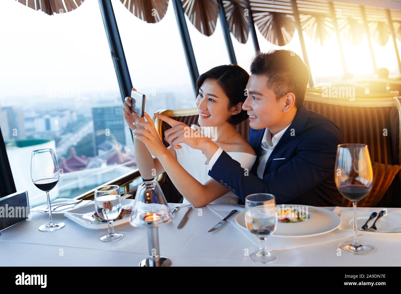 Young couples in the restaurant Stock Photo - Alamy