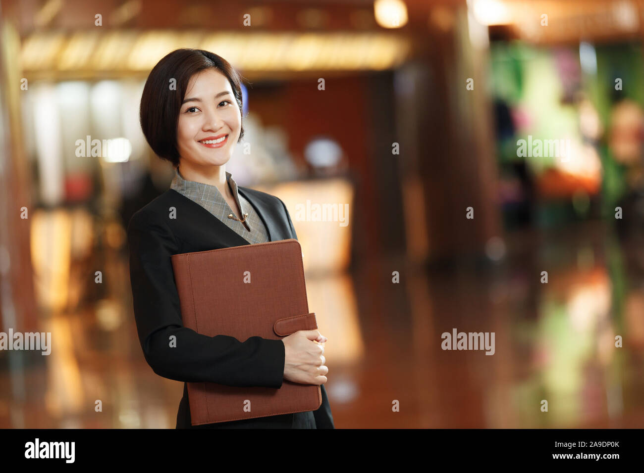 Oriental hotel manager hi-res stock photography and images - Alamy