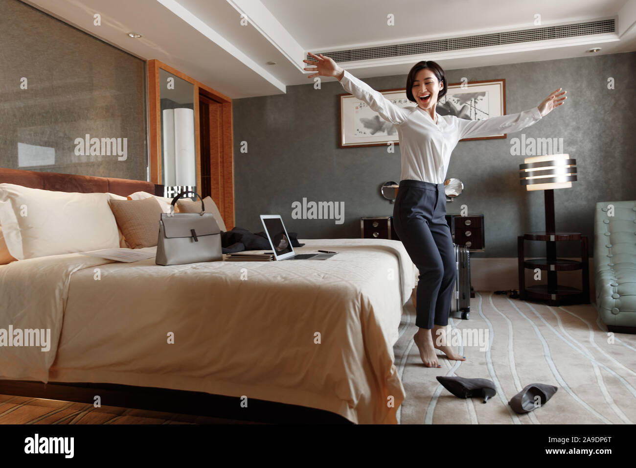 Exciting young woman Stock Photo - Alamy