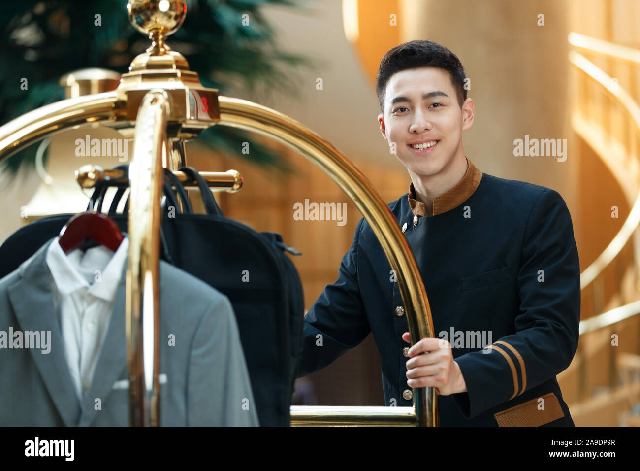 The hotel waiter Stock Photo - Alamy