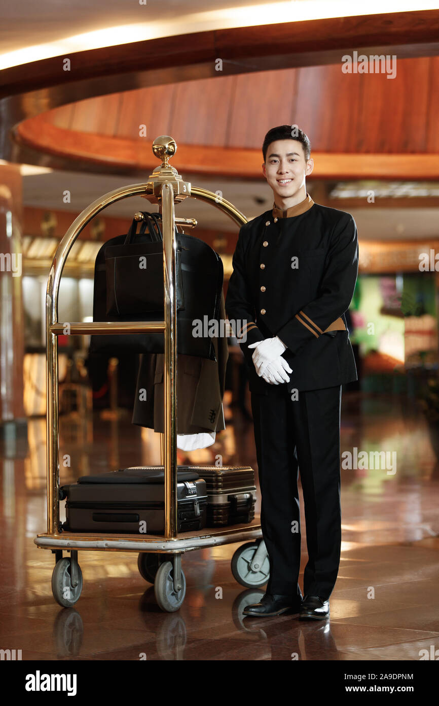 Hotel waiter hi-res stock photography and images - Alamy