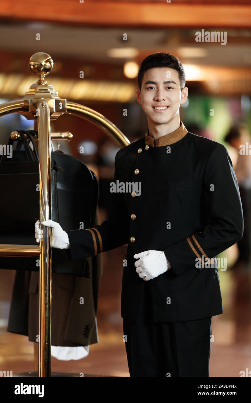 The hotel waiter Stock Photo - Alamy