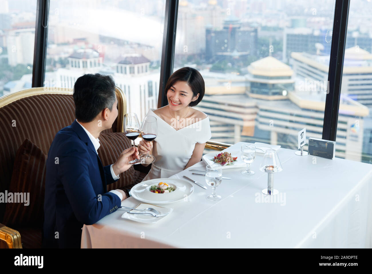 Young couples in the restaurant Stock Photo - Alamy