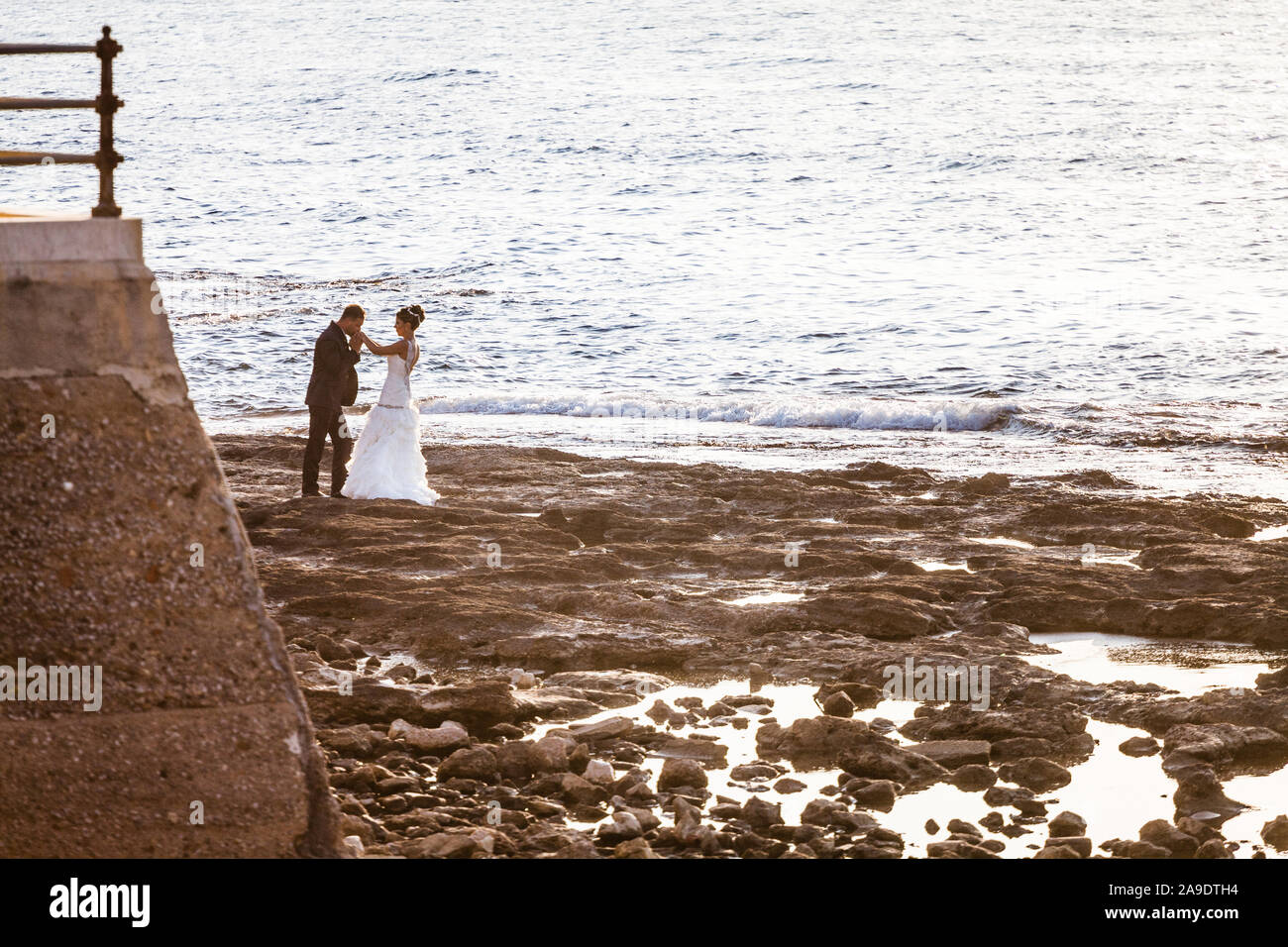 Wedding couple at the sea Stock Photo - Alamy