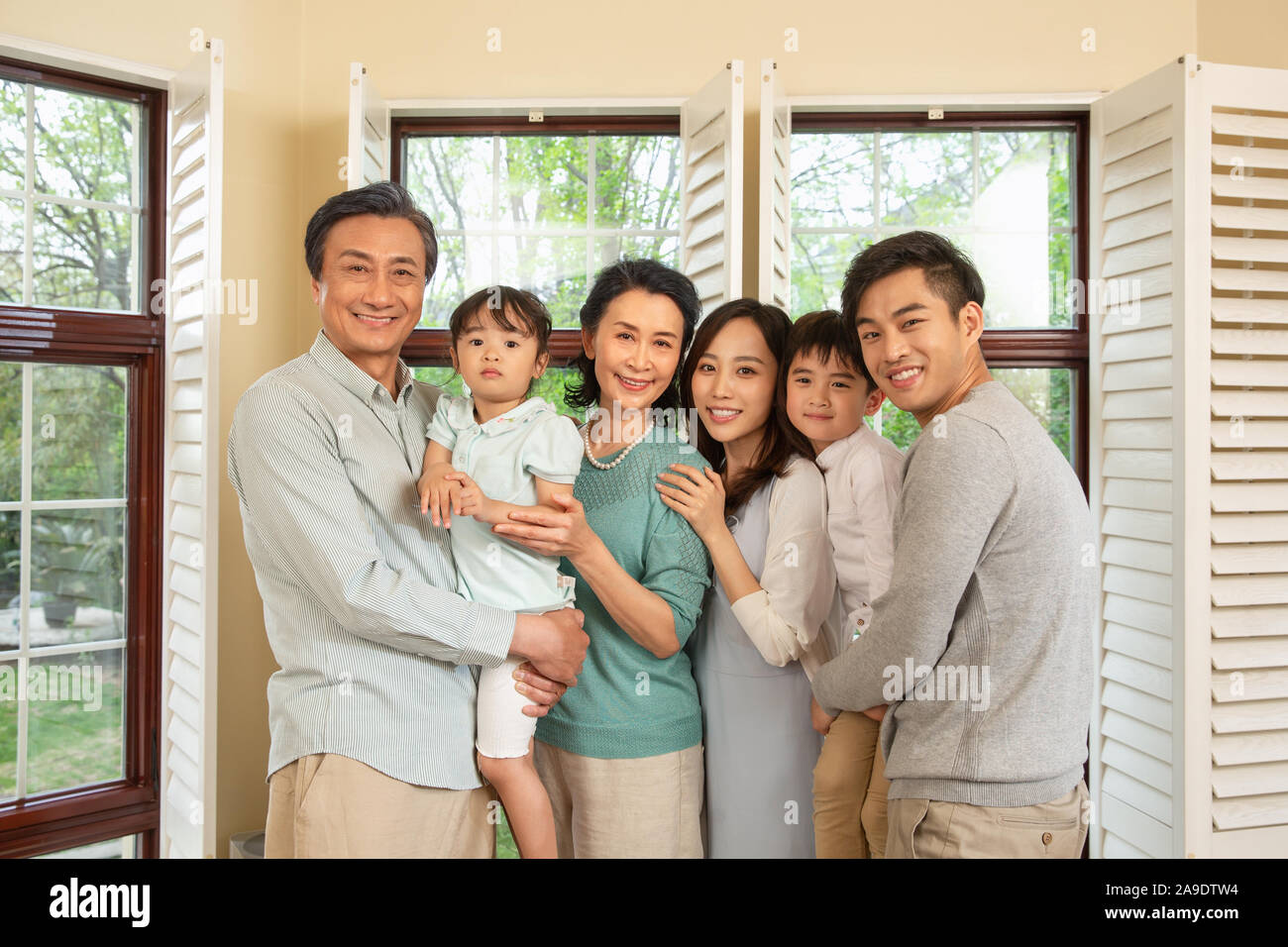 A happy family Stock Photo - Alamy
