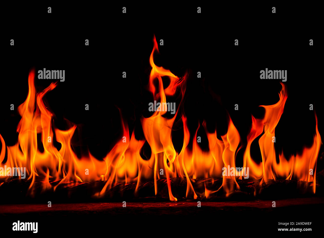 Fire flames on Abstract art black background, Burning red hot sparks ...
