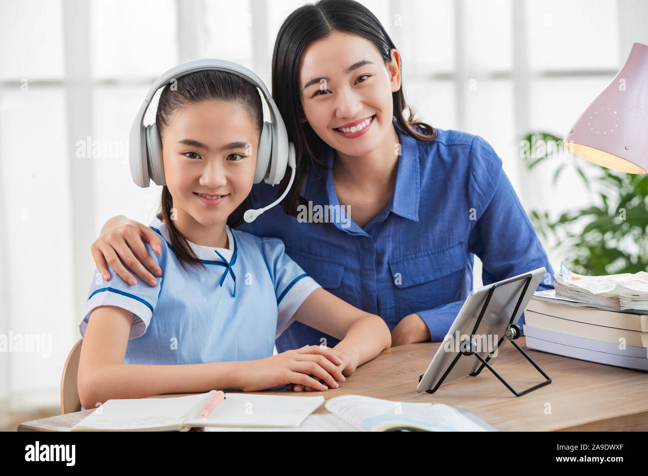The teacher and students one-on-one online education Stock Photo - Alamy
