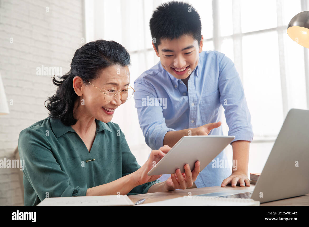 Old people learn to use computers Stock Photo - Alamy