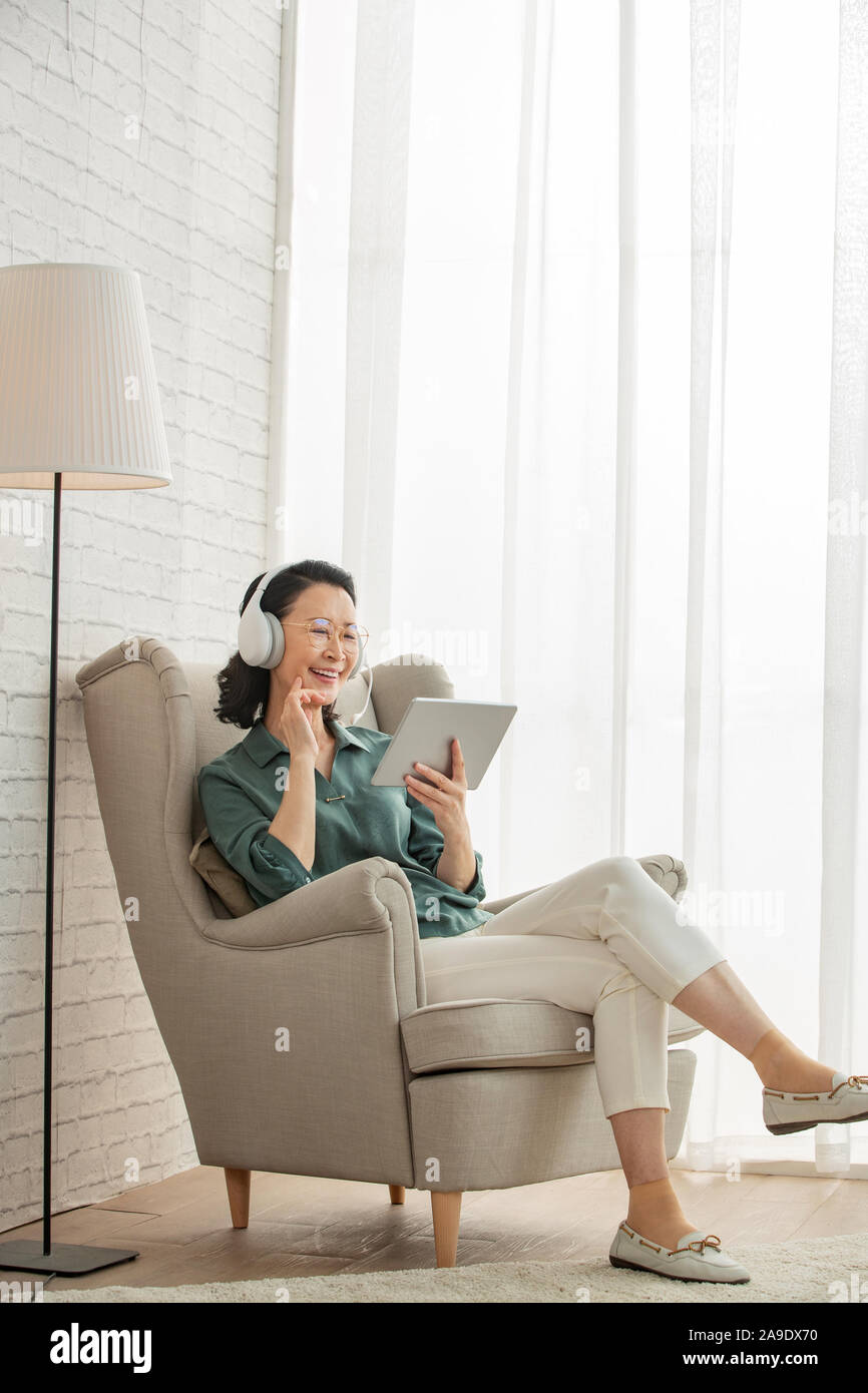 Old people use tablet computers Stock Photo - Alamy