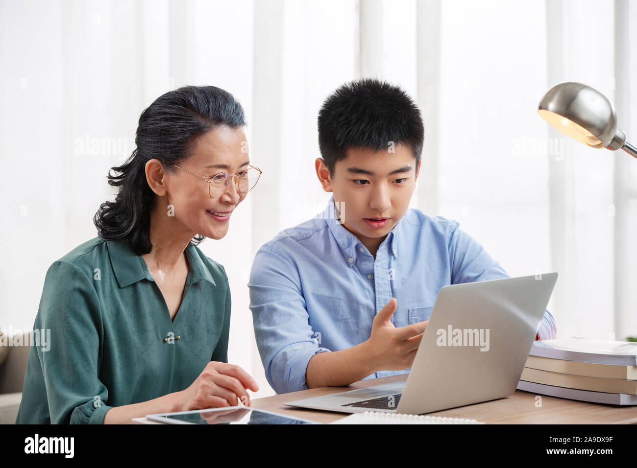 Old people learn to use computers Stock Photo - Alamy