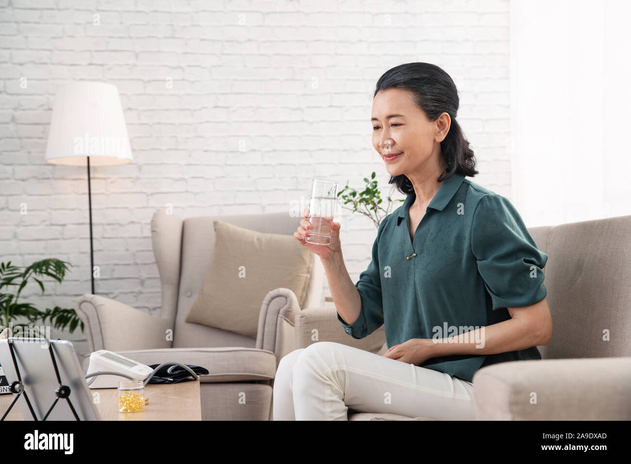 Indian senior drink water hi-res stock photography and images - Alamy