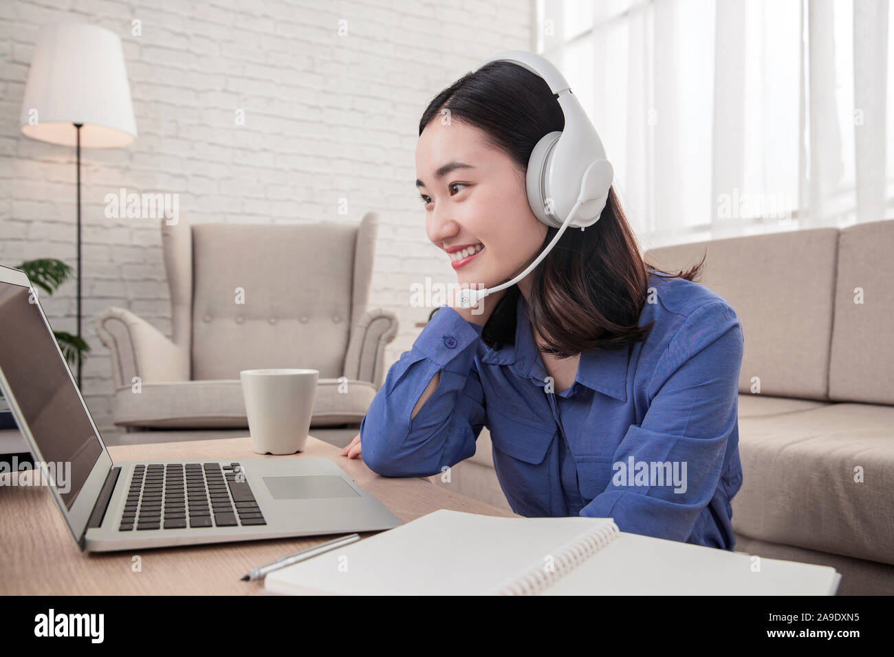 Young women online learning Stock Photo - Alamy