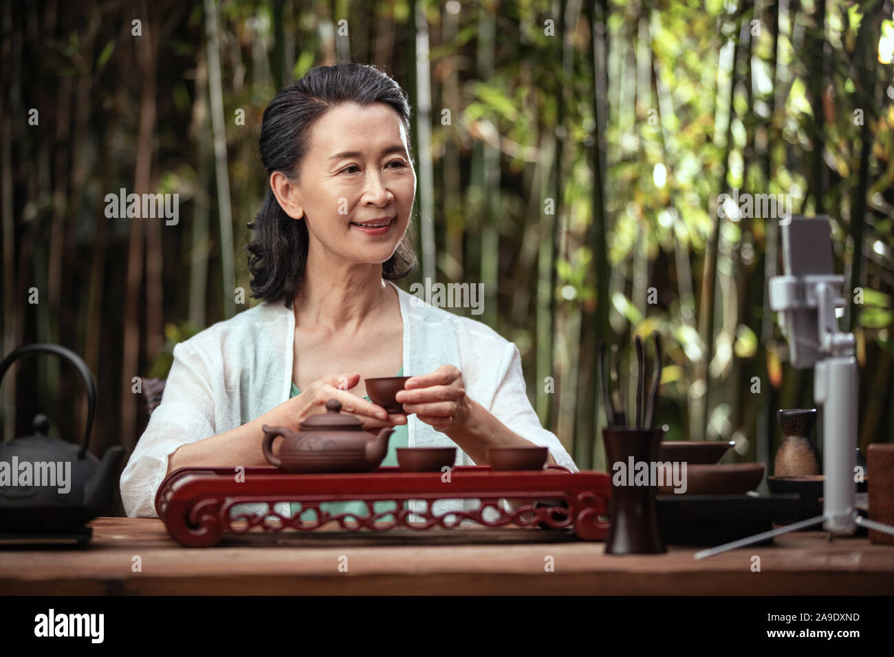 The elderly live online tea art Stock Photo - Alamy